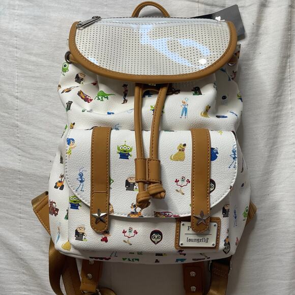 Loungefly | Bags | Nwt Loungefly Pixar Character Allover Print Pin ...